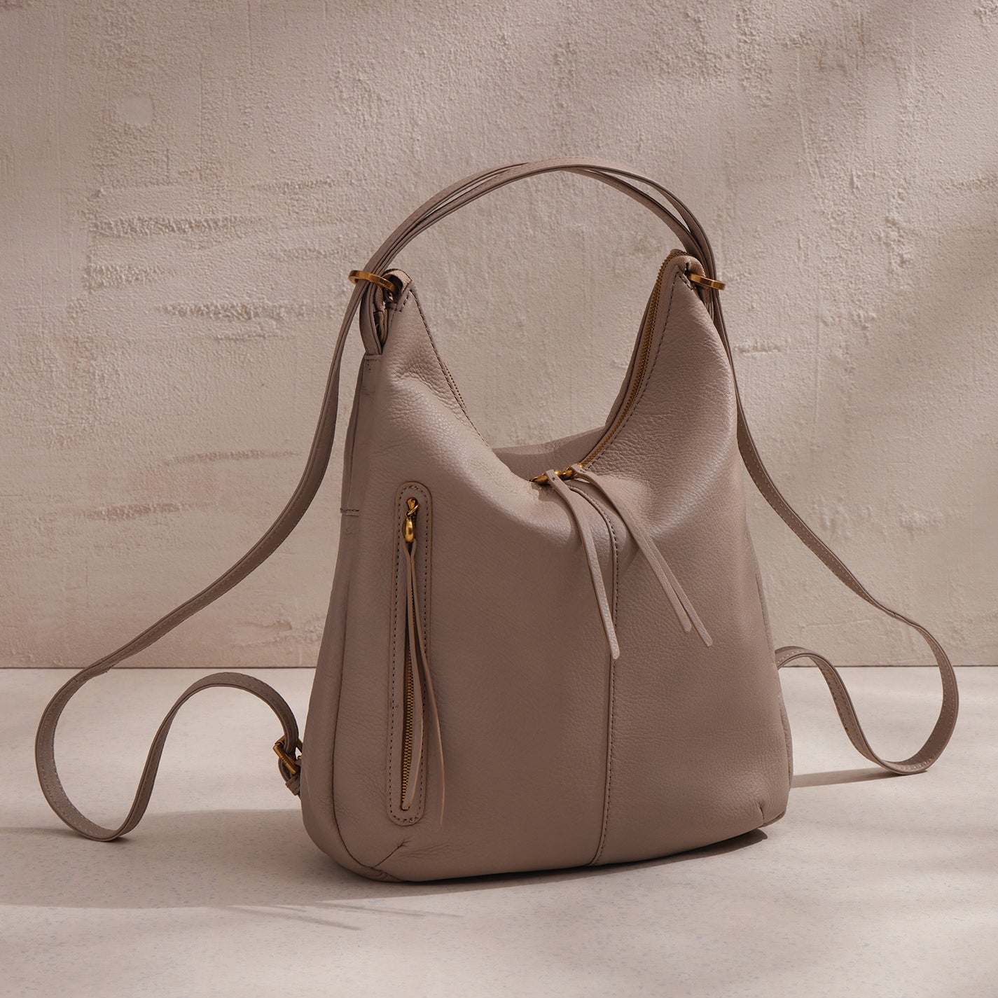 Merrin Convertible Backpack in Pebbled Leather - Taupe – HOBO